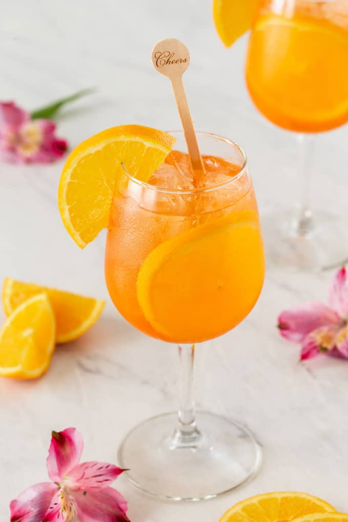 Sip Champagne Cocktail: Sparkling Sunset | The Sip Society